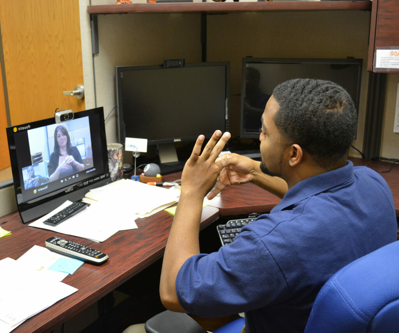 Officials pass out free cue cards to help bridge gap between police ...